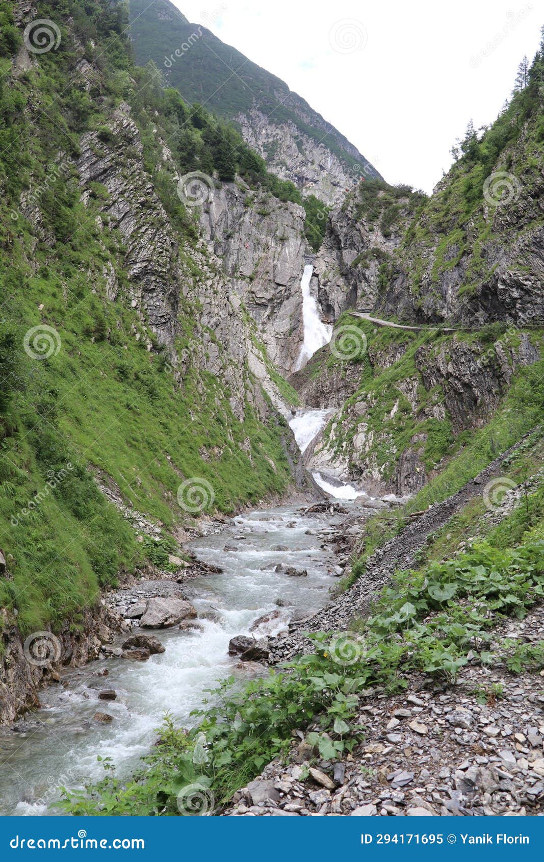 Landscape with a Mountain River and a Tall Double Waterfall in the ...