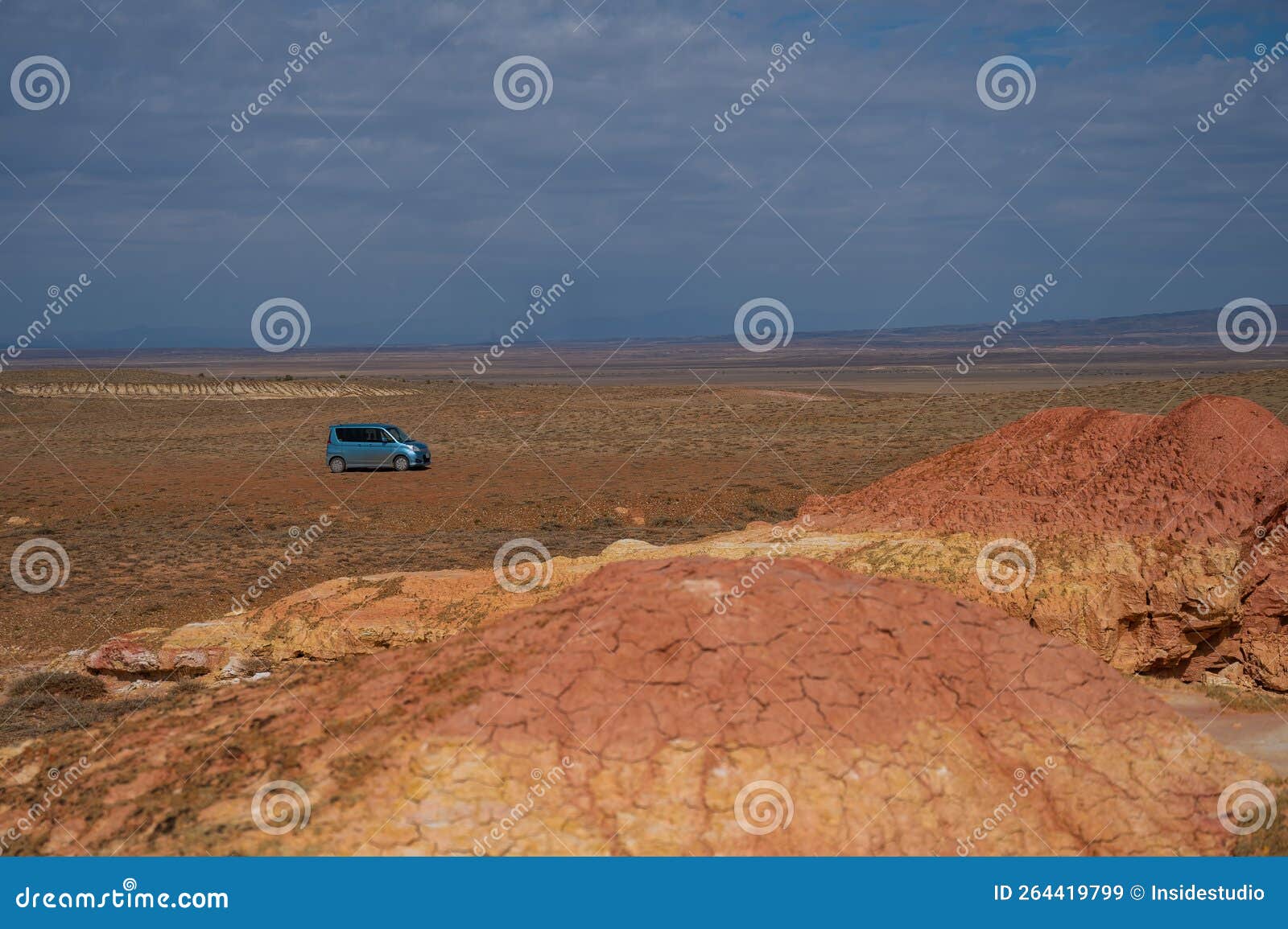 Landscape of Multi-colored Clay Dunes. Mars on Earth. Blue Car. Stock ...