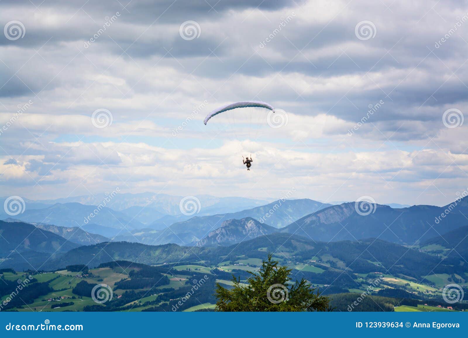 Landscape with a paraplane stock photo. Image of parachute - 123939634