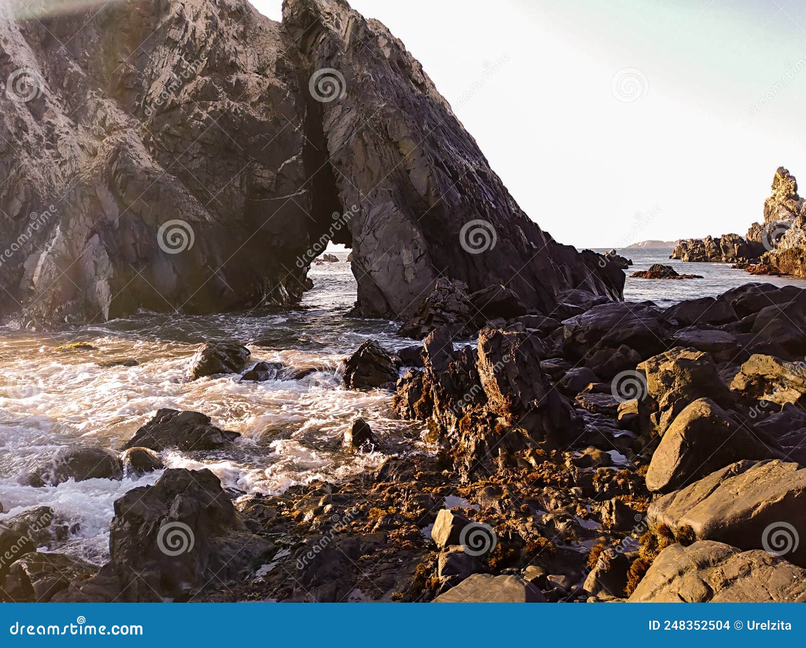 Landscape of Rock Formations and Cliffs on the Seashore at Sunset in ...
