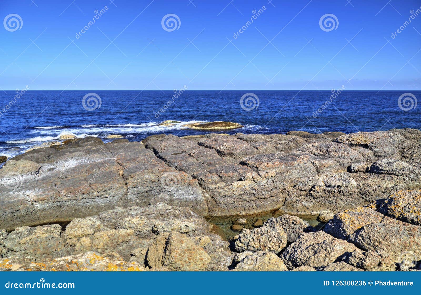 Landscape on rocky shore stock photo. Image of peaceful - 126300236