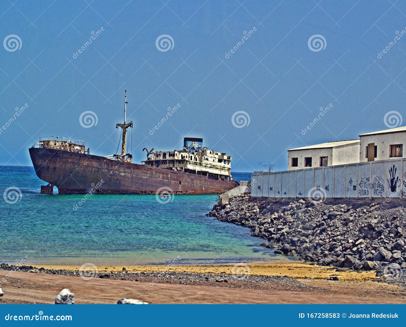 Landscape with a Rusty Broken Large Ship Stranding Offshore in the ...