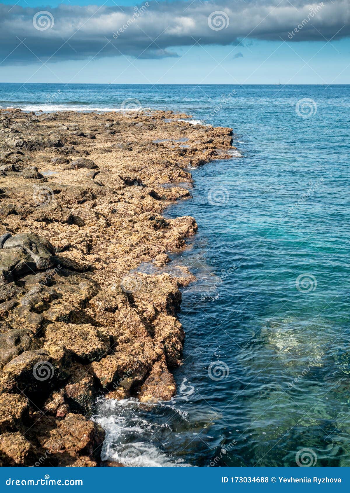 Beautiful Landscape of Sharp Cliffs and Rocks and Calm Ocean Water ...