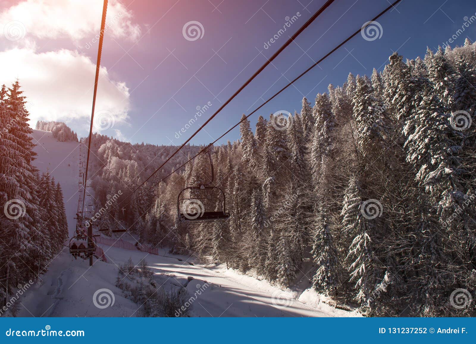 Landscape of Ski Lift in Mountains on Snowy Day at Sunset Stock Photo ...