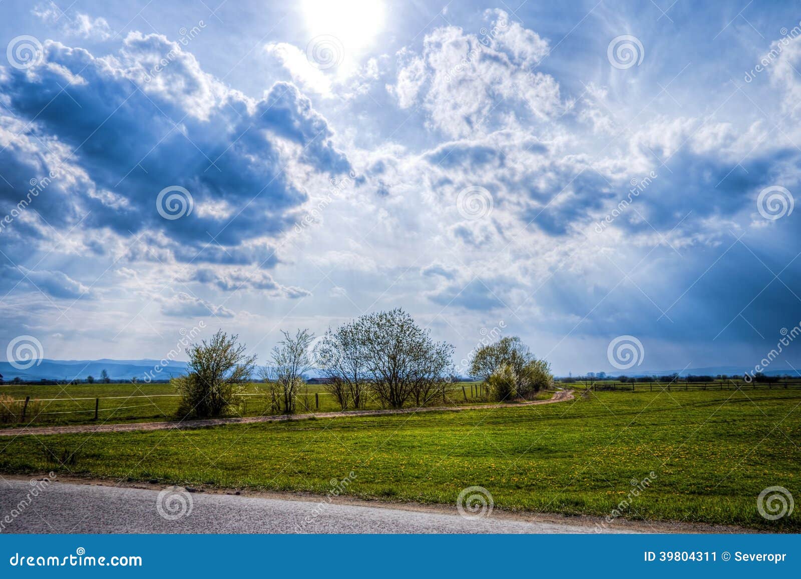 Landscape with Sunset and Clouds Stock Image - Image of field, grass ...