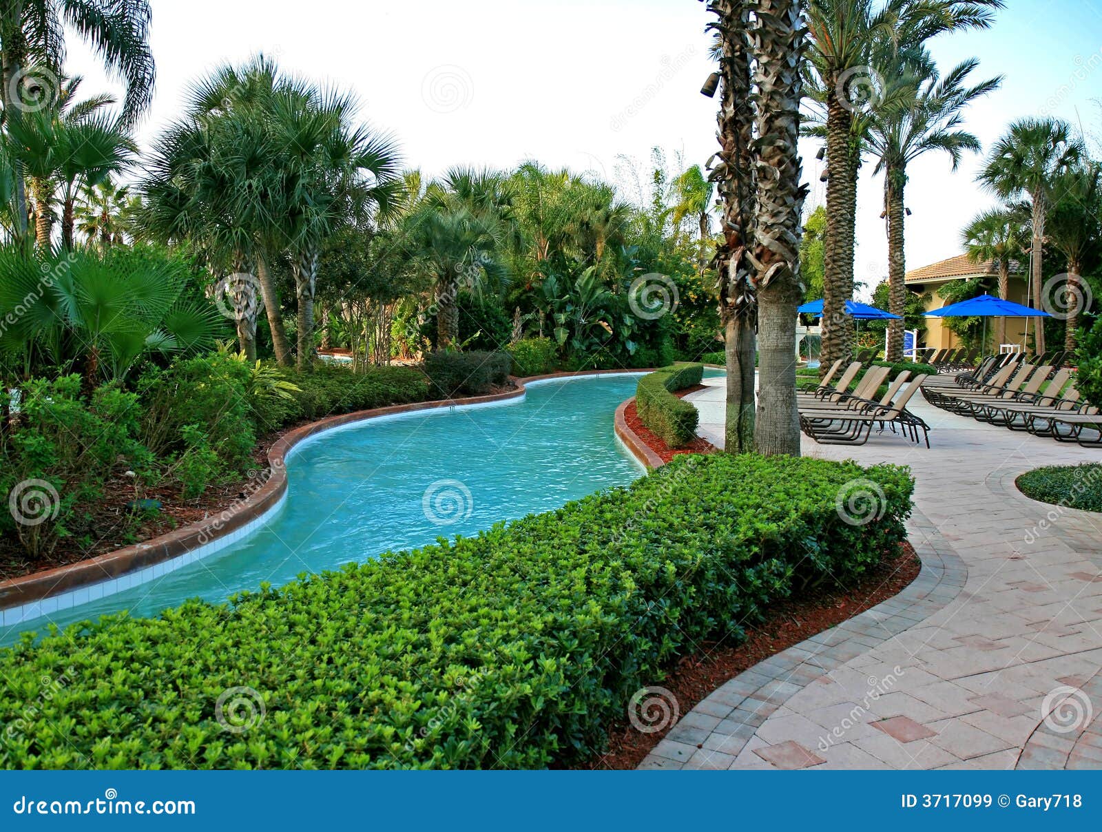 The Landscape and Swimming Pool in a Resort Stock Image - Image of pool ...