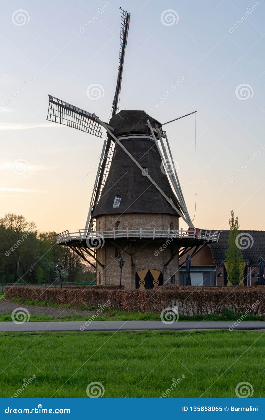 Landscape with Traditional Dutch Grain Wind Mill and Blue Sky on Sunset ...