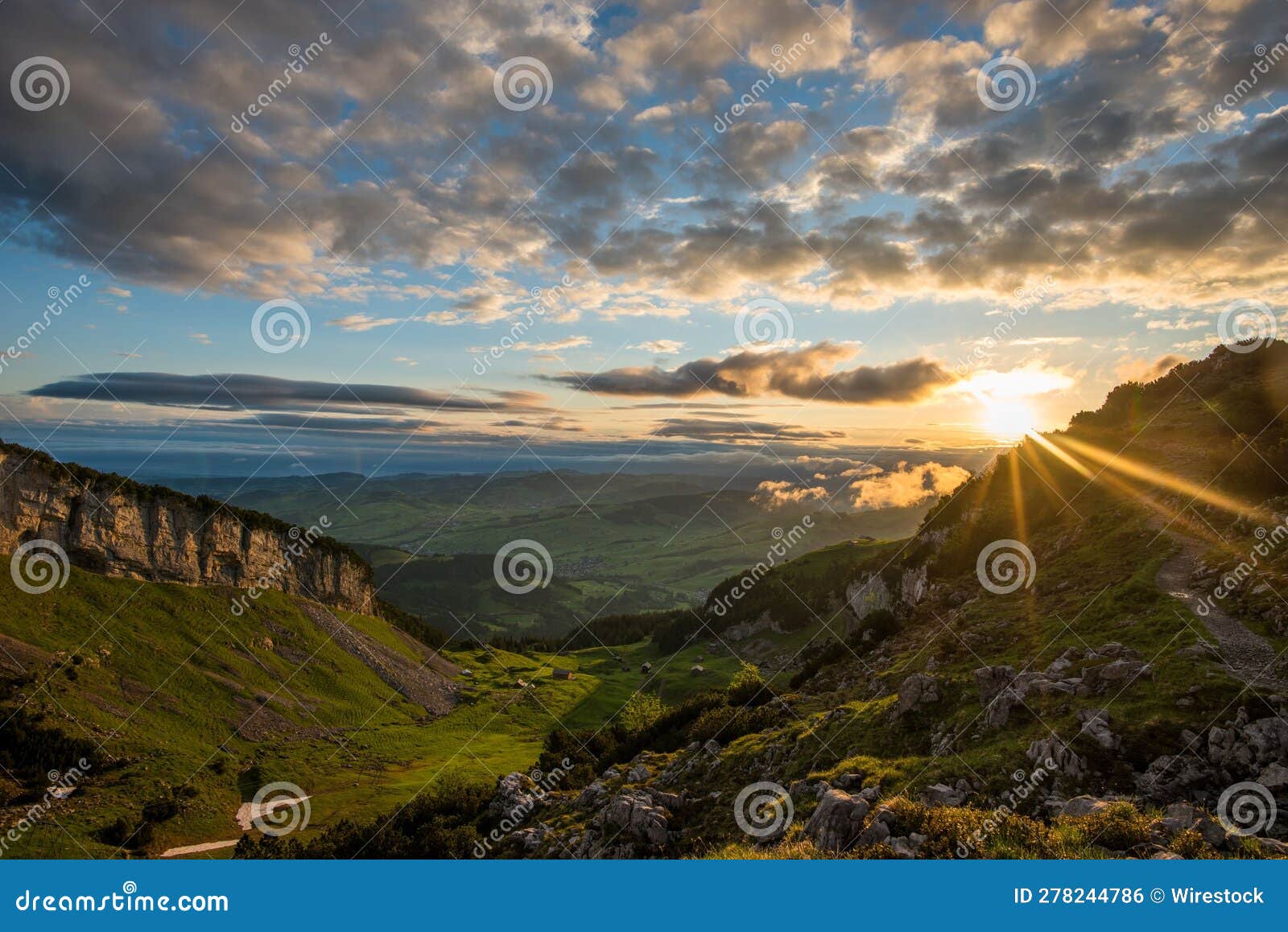 Landscape of a Valley Surrounded by Mountains during the Sunrise Stock ...