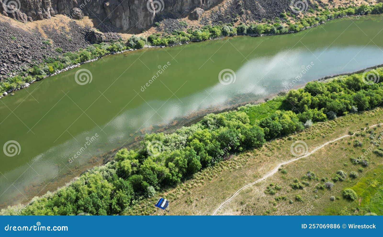 Landscape View of the River Surrounded by Trees, Shrubs and Rocks Stock ... Landscape View of the River Surrounded by Trees, Shrubs and Rocks Stock ...
