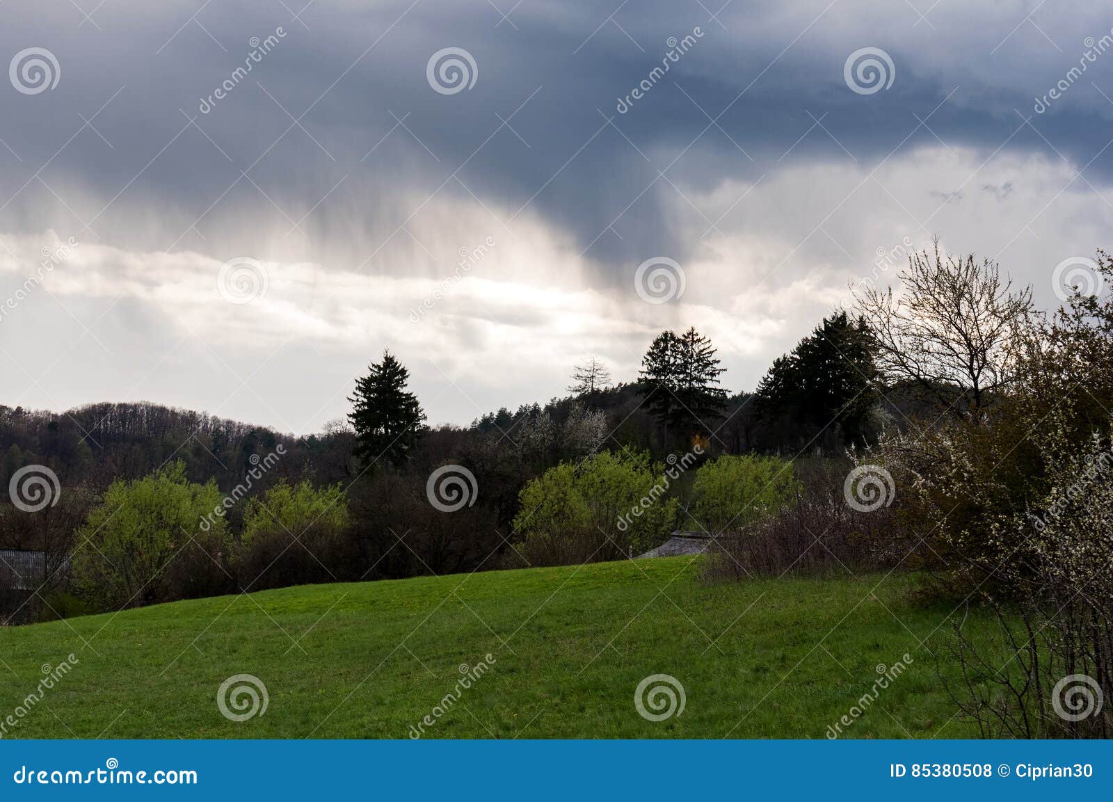 Landscape View of a Stormy Sky and Green Meadow Stock Photo - Image of ...