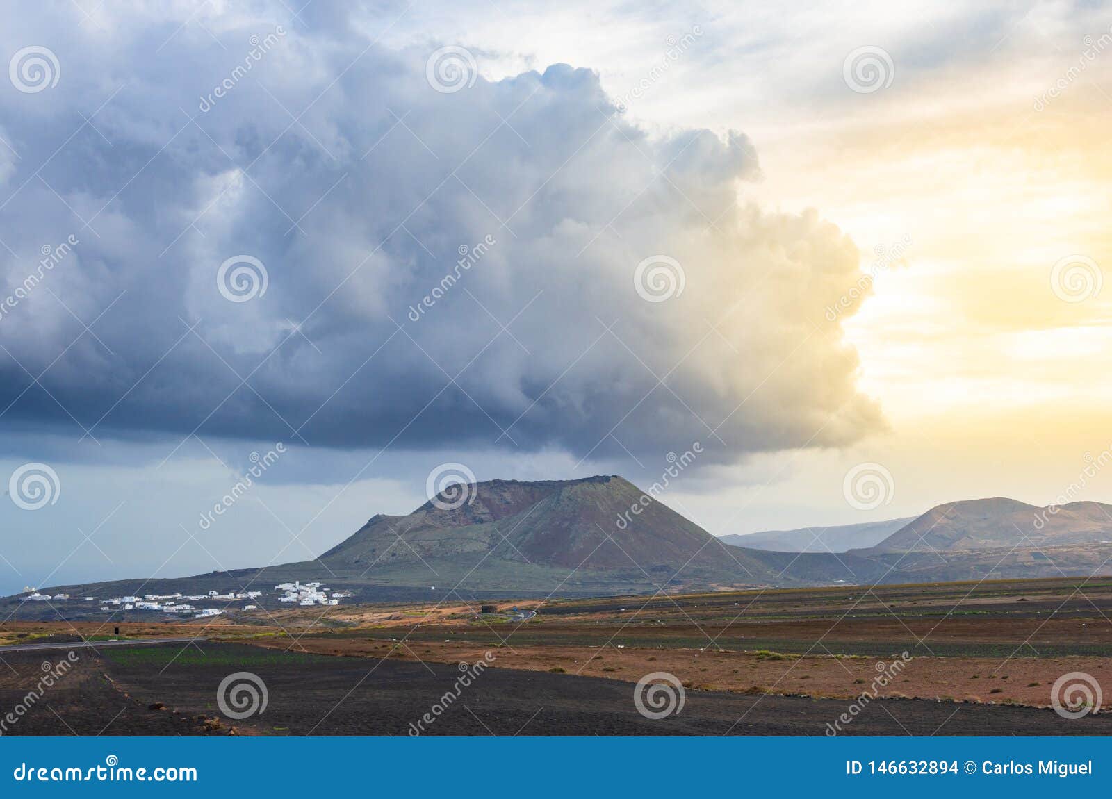 Landscape of a Volcano at Sunset on a Cloudy Day Stock Photo - Image of ...