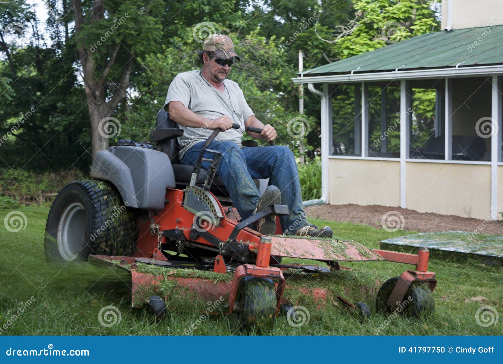 Landscaper on Riding Lawn Mower Stock Photo - Image of cutter, bush ...