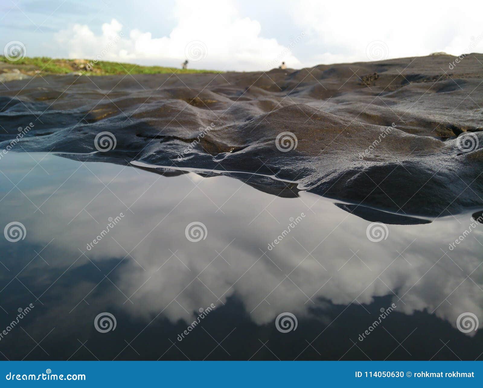 Puddle Sea Water Stock Photos - Royalty Free Images