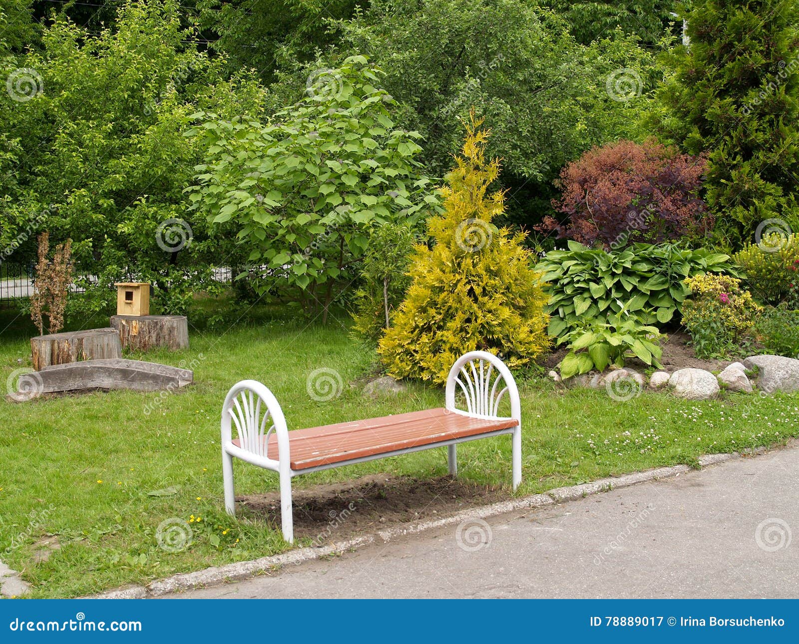 Landscaping with a bench stock image. Image of tunberg - 78889017
