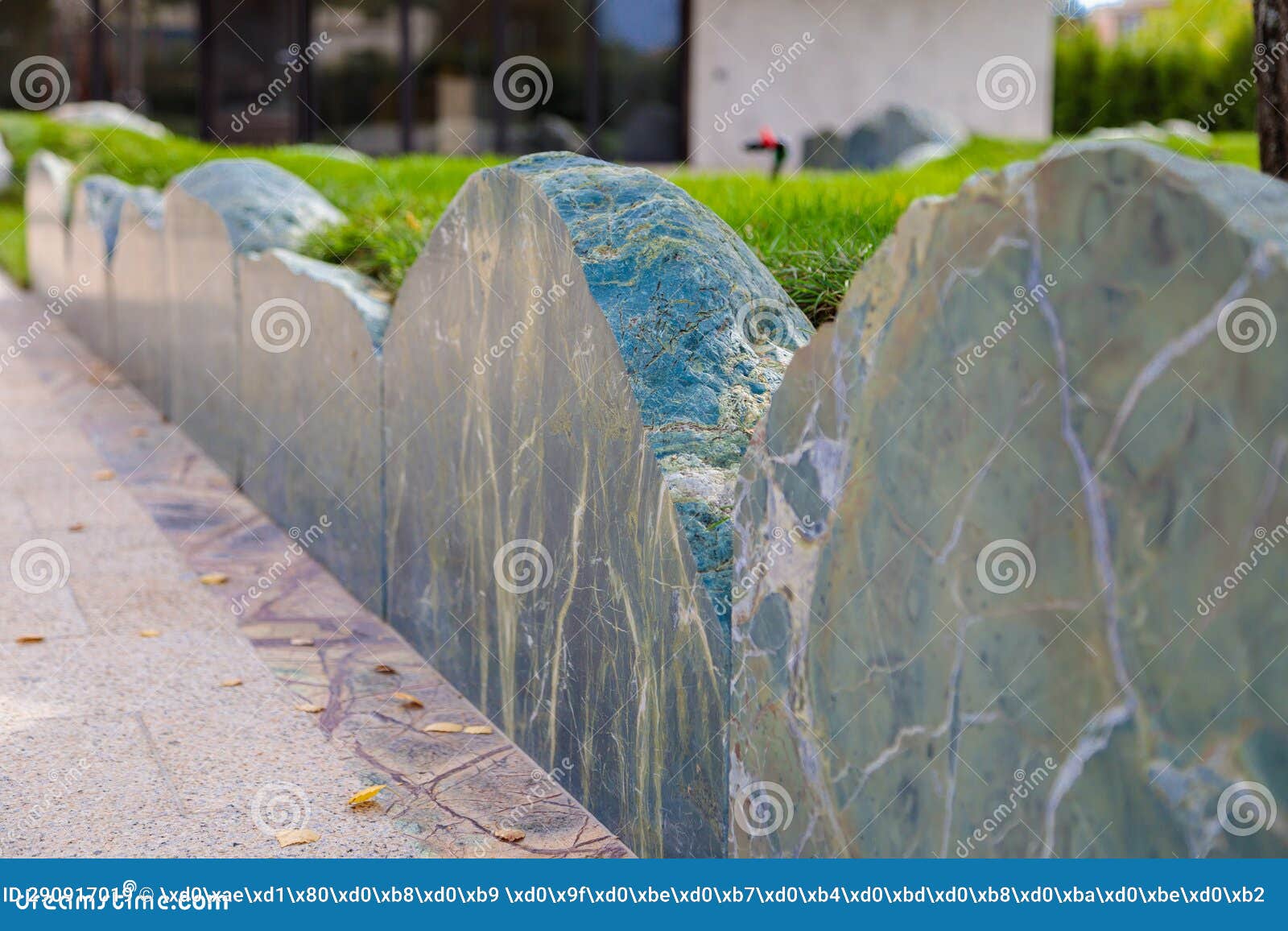 Landscaping, Edging the Path with Boulders of Diabase Stone. Stock ...