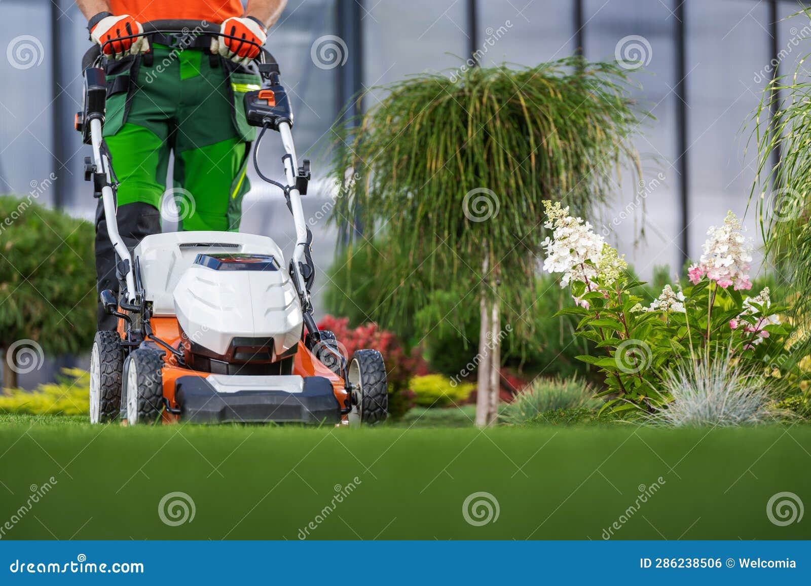 Landscaping Garden Keeping Worker Mowing Back Yard Lawn Stock Photo ...