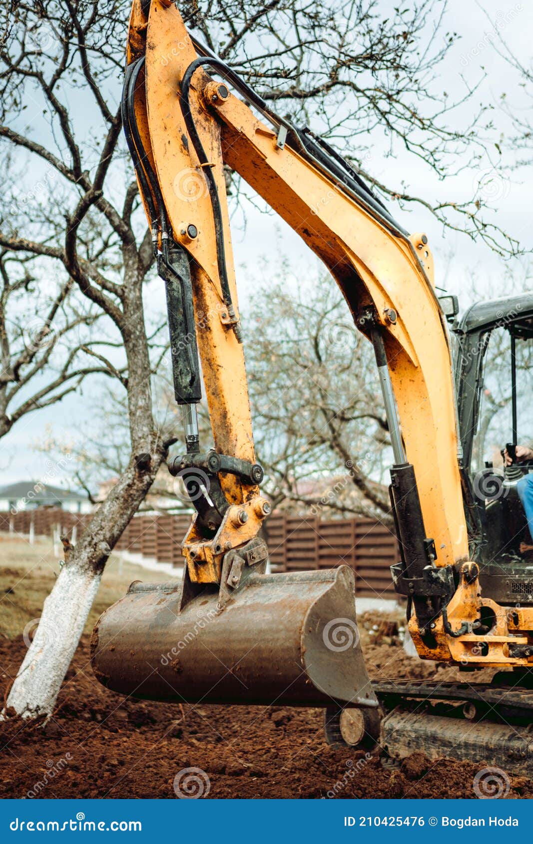 Landscaping Works with Bulldozer and Excavator at Home Construction ...