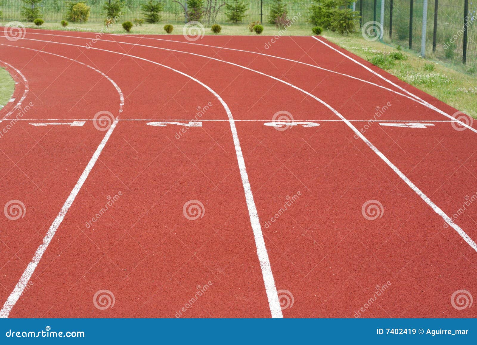 Lanes of a red race track stock image. Image of athletic - 7402419