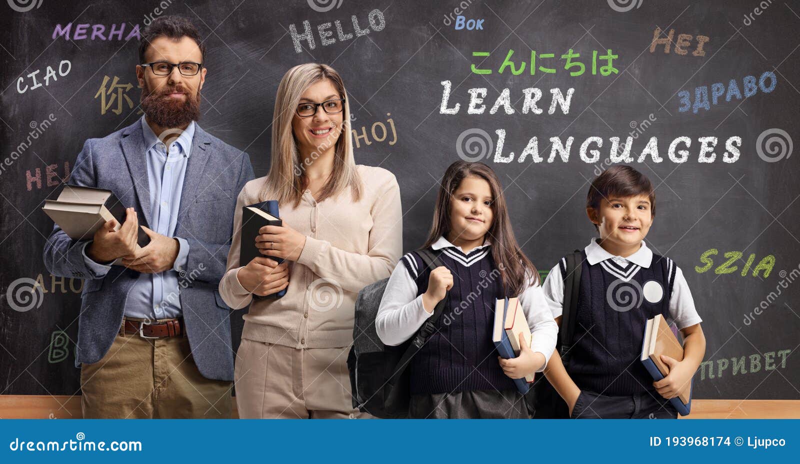 Language Teachers and Pupils Posing in Front of a Blackboard with Text ...