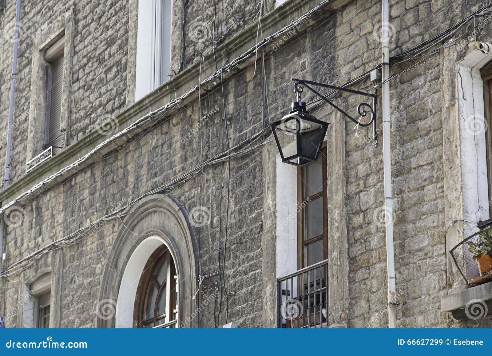Lantern on a facade stock image. Image of illumination - 66627299
