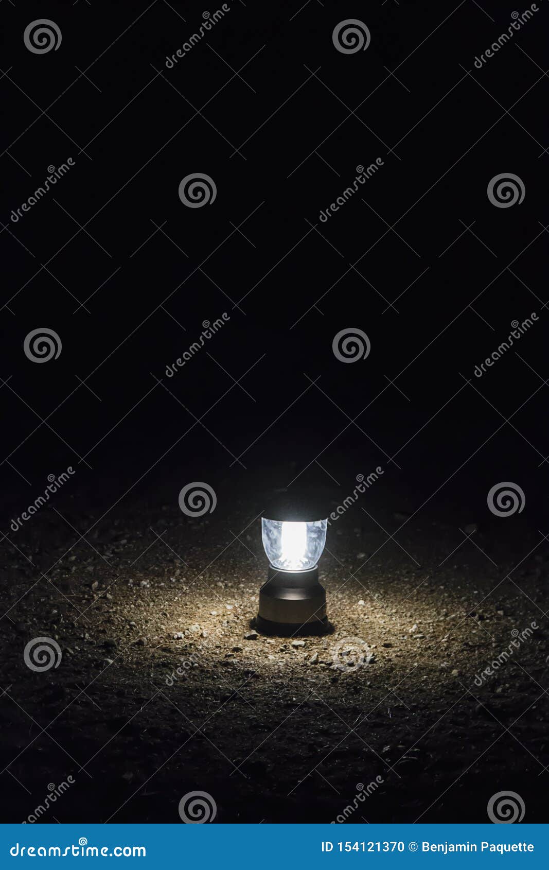 Lantern in the Middle of the Ground in a Campsite Stock Photo - Image ...