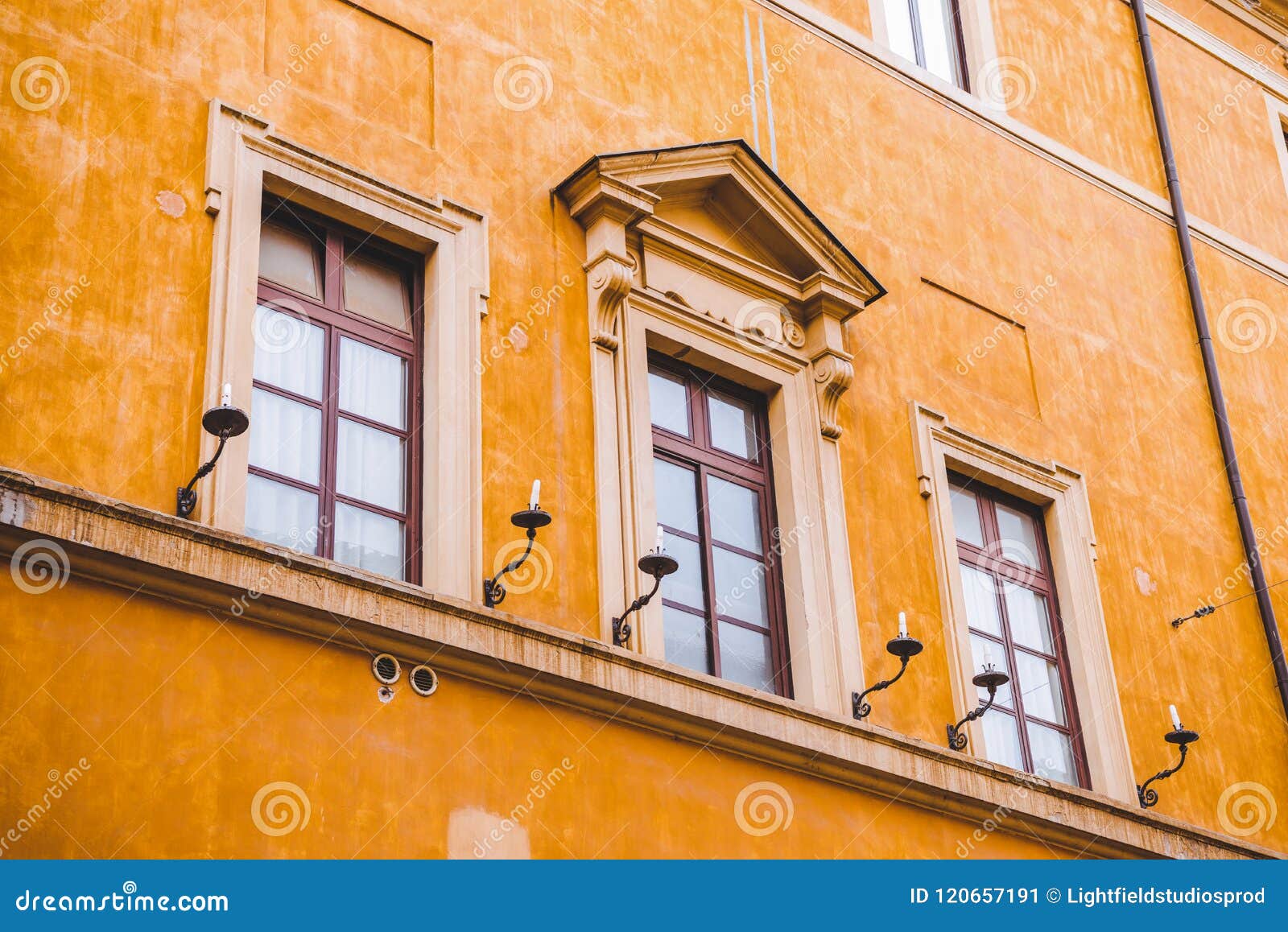 Lanterns on Orange Building Stock Image - Image of culture, vacation ...
