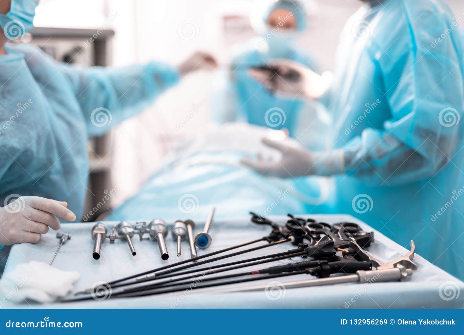 Laparoscopic Instruments On Table With Medical Workers On Background ...