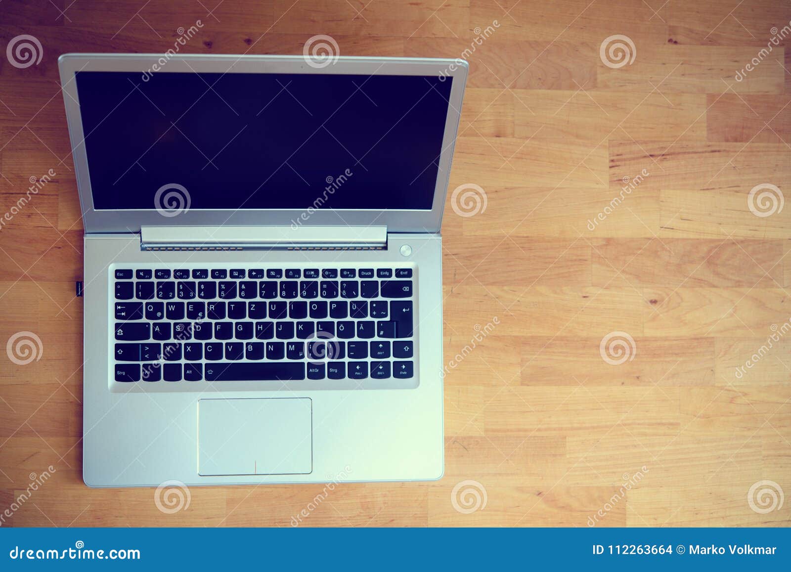 Laptop on wooden ground stock photo. Image of close - 112263664
