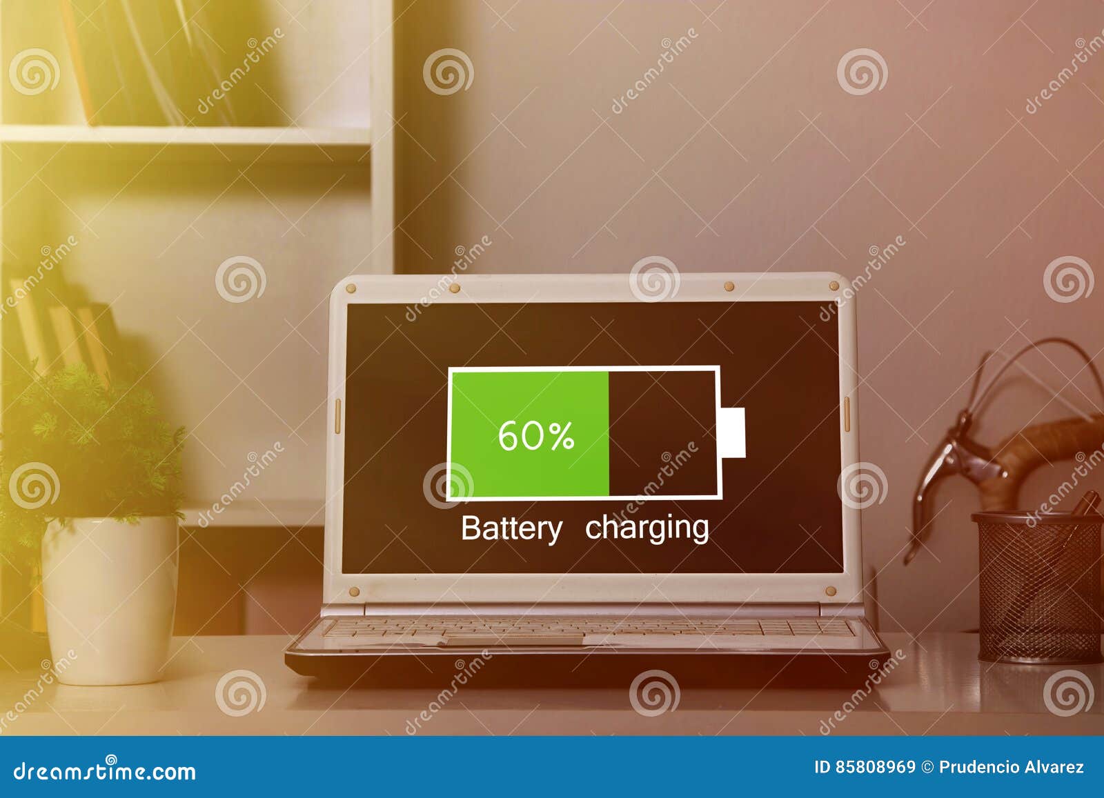 Laptop battery charging stock image. Image of ecology - 85808969