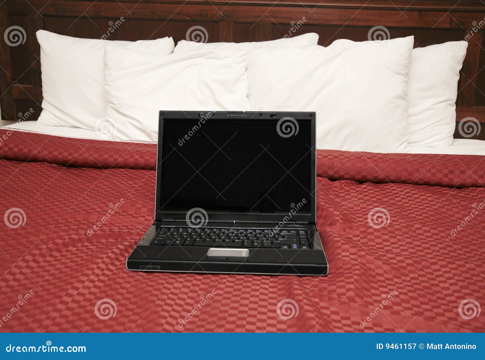 Laptop on bed stock image. Image of browsing, relaxation - 9461157