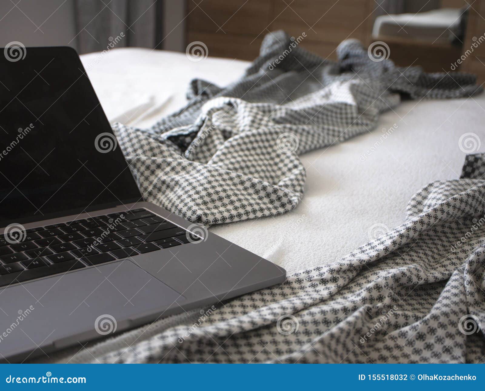 Laptop on the Bed. Work at Home Stock Photo - Image of light, bedroom ...