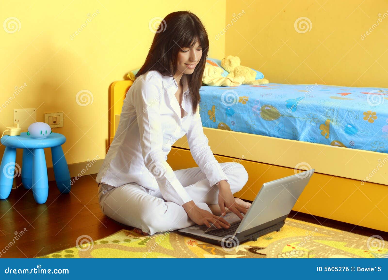 Laptop in bedroom stock photo. Image of woman, home, smile - 5605276