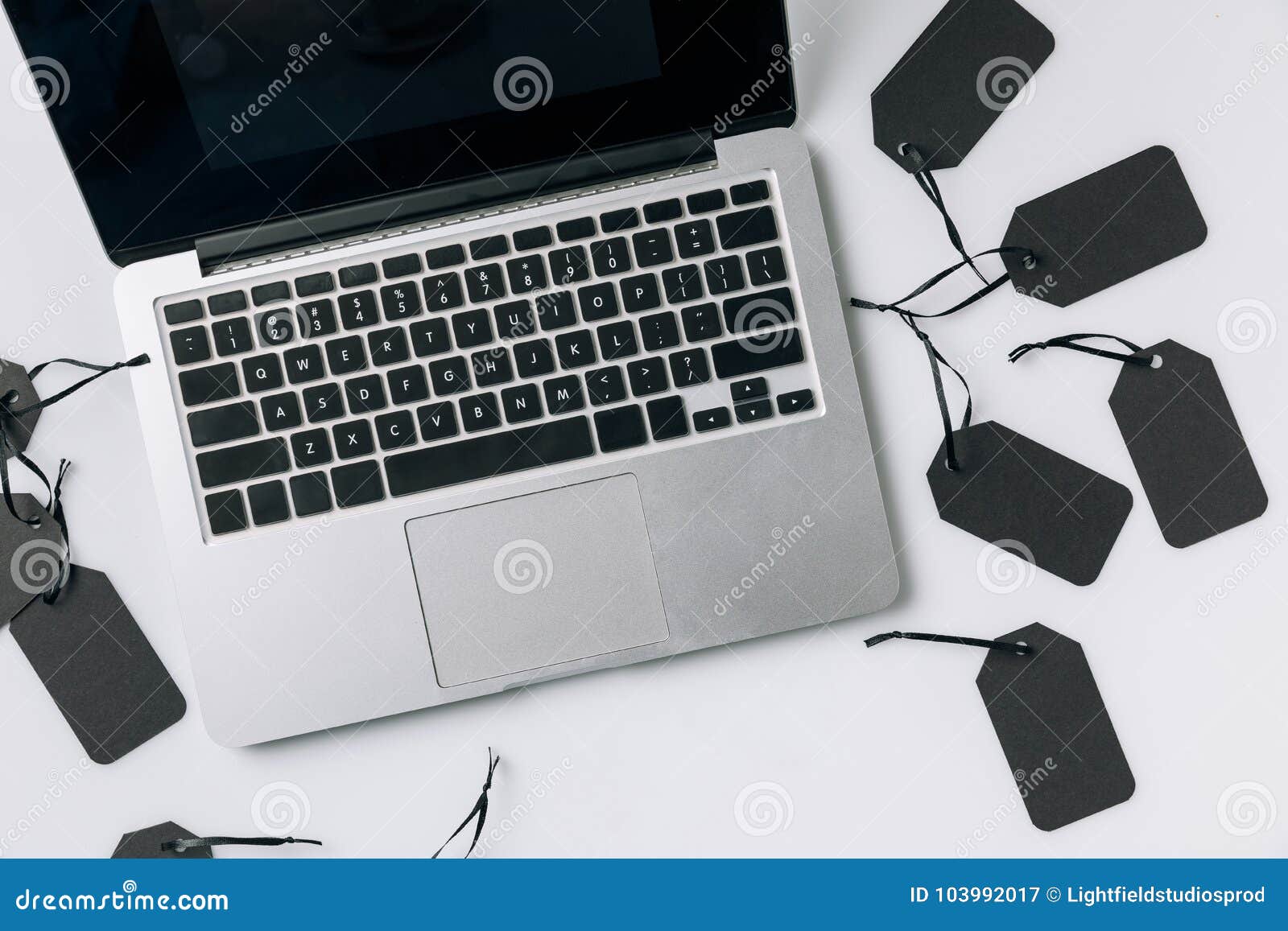 Laptop and blank labels stock image. Image of discount - 103992017