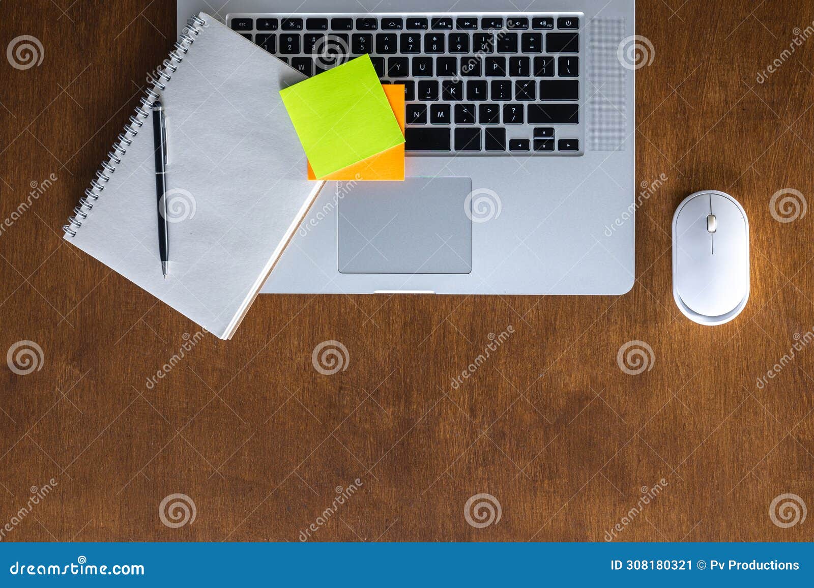Laptop, Blank Notepad and Computer Mouse on a Wooden Table, Top View ...