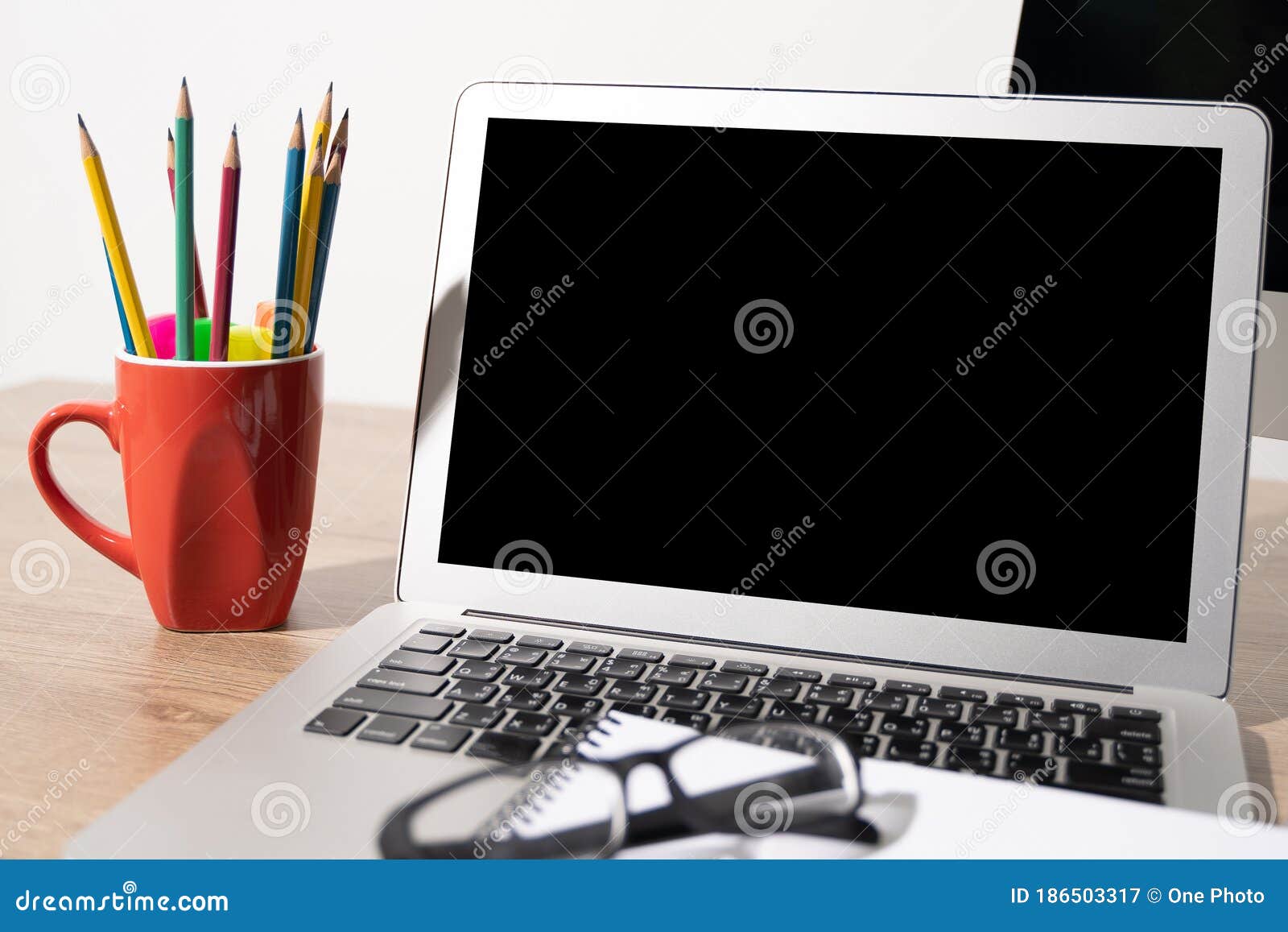 Laptop with Blank Screen on Table. Workspace Background New Project on ...