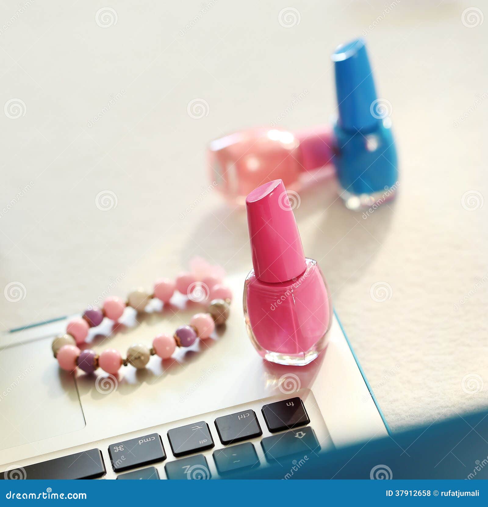 Laptop, Bracelet and Nail Polish Stock Photo - Image of device, liquid ...