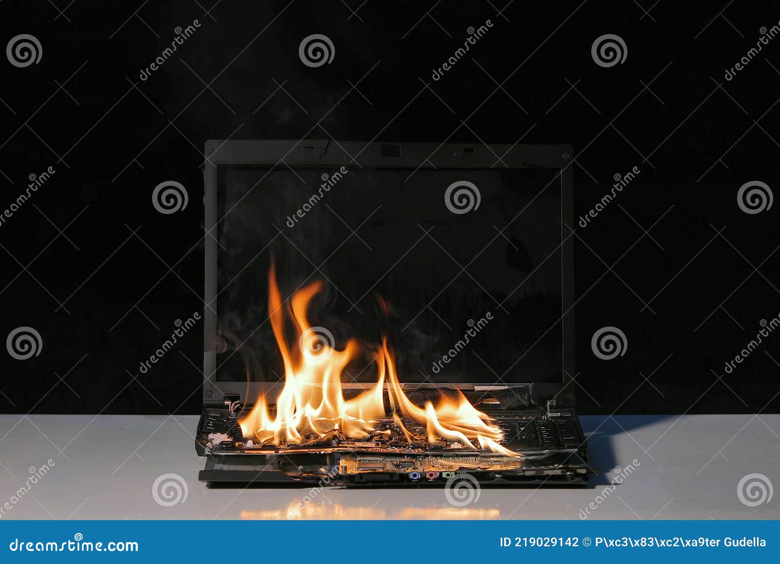 Burning laptop computer stock photo. Image of loss, frying - 219029142