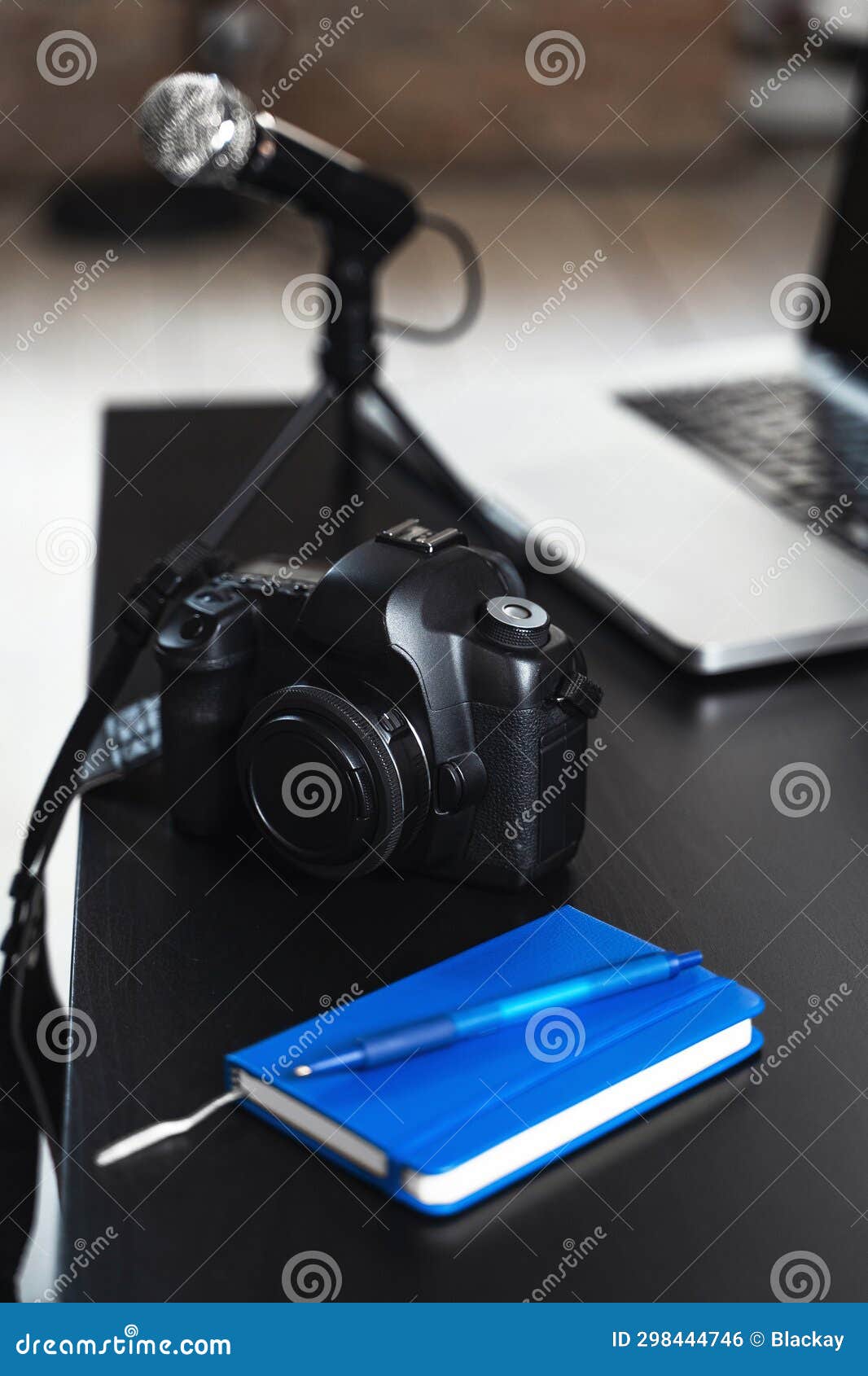Laptop, Camera, Microphone, and Notebook on a Journalist S Work Desk ...
