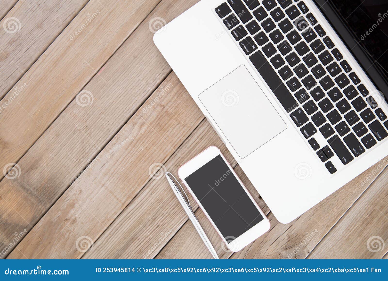 A Laptop and a cell phone editorial stock image. Image of keyboard ...