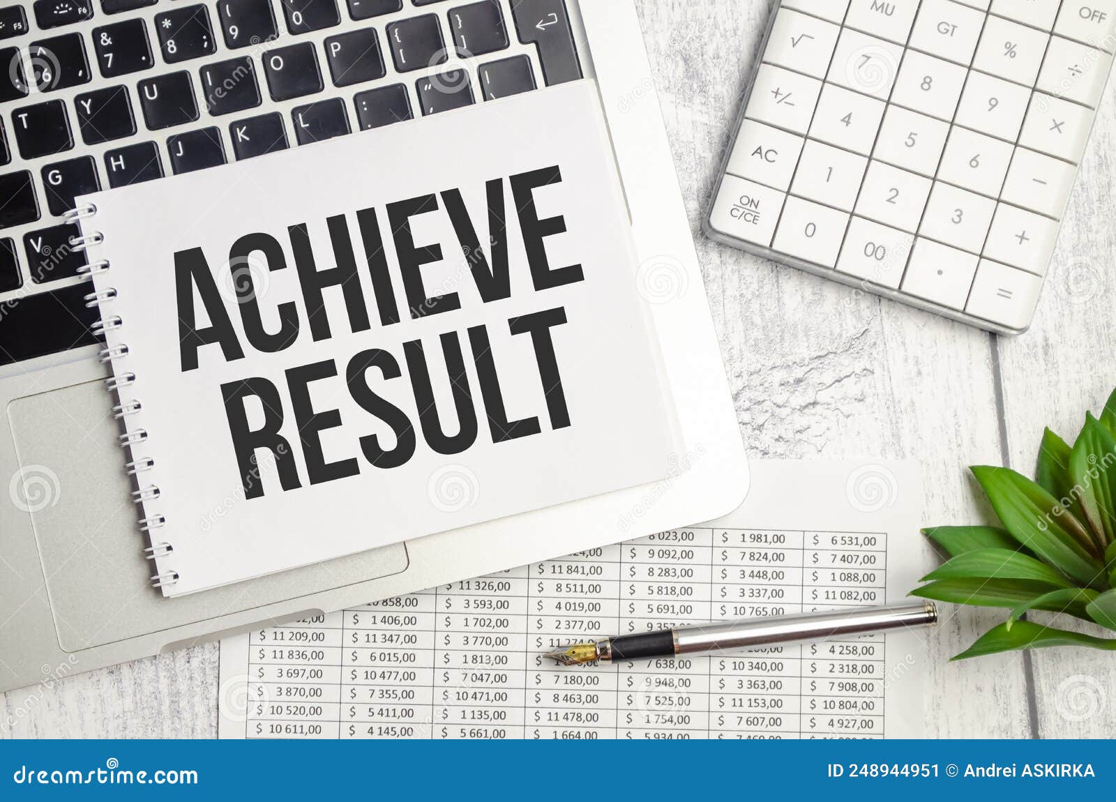 Laptop Charts, Pen and a White Notebook with the Text Achieve Result ...