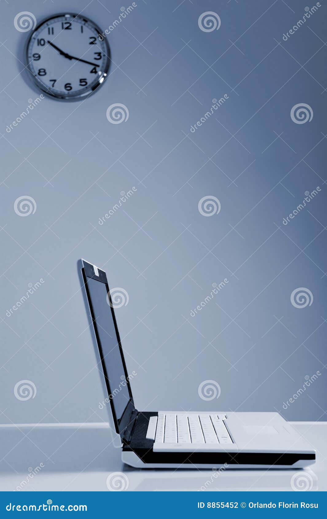 Laptop and clock stock photo. Image of white, desk, clock - 8855452