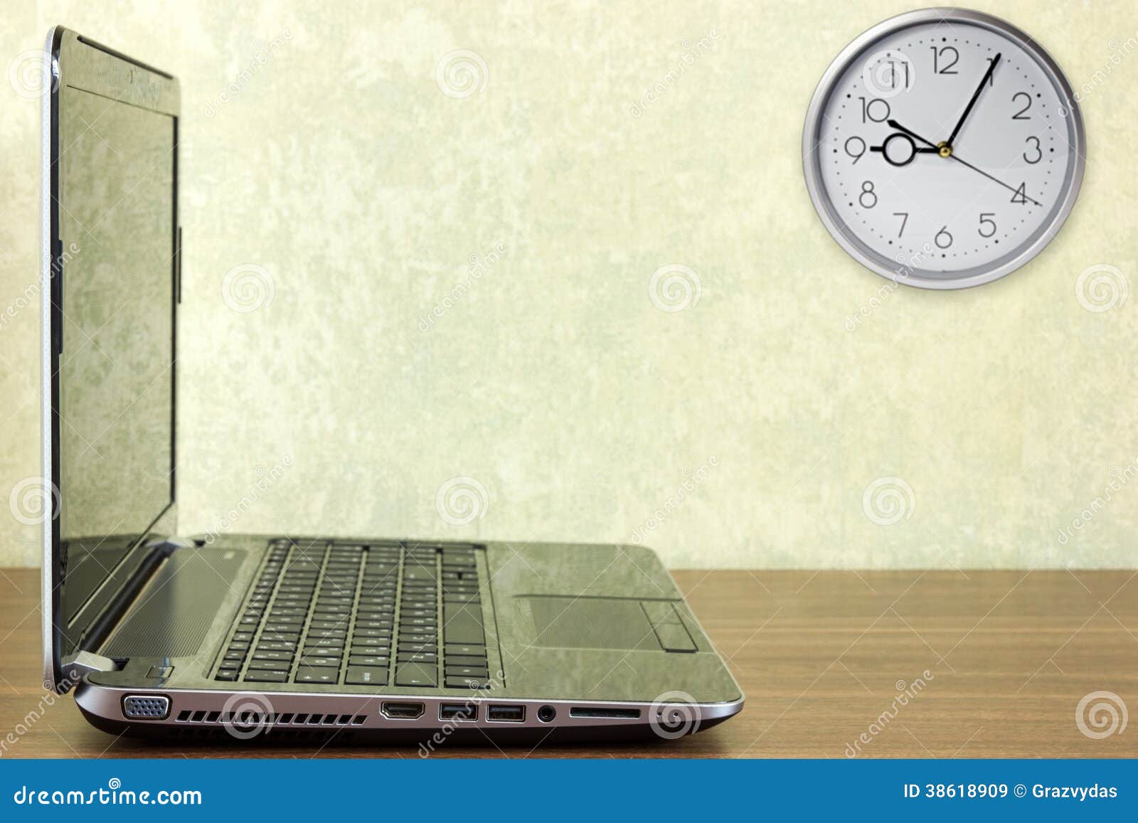 Laptop and clock stock image. Image of portable, clock - 38618909
