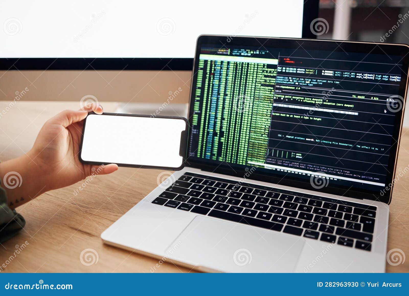 Laptop, Coding and Hands with Mockup Phone for Website Hacking, Programming or Cybersecurity ...