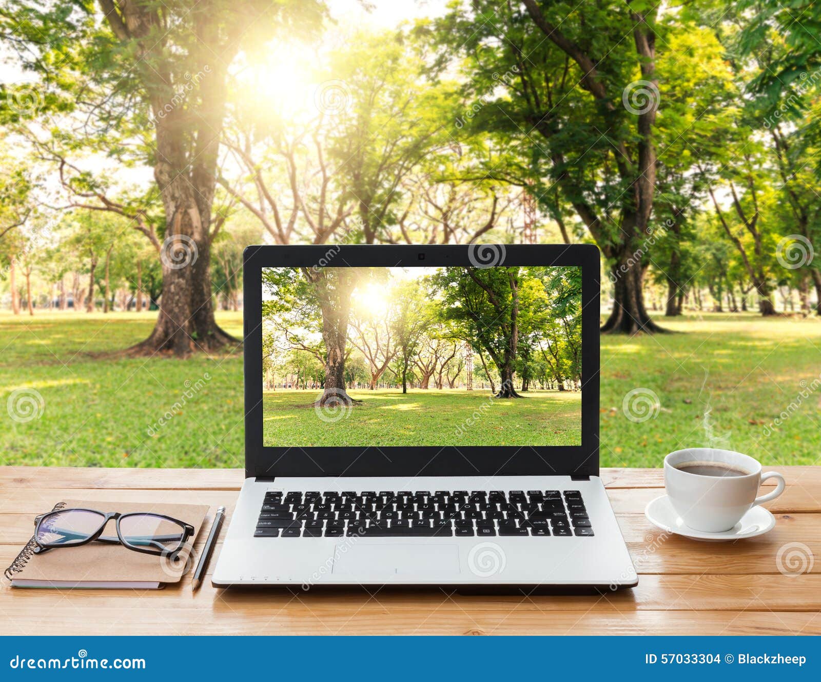 Laptop And Coffee On Wood Workspace And Park Background Royalty-Free ...