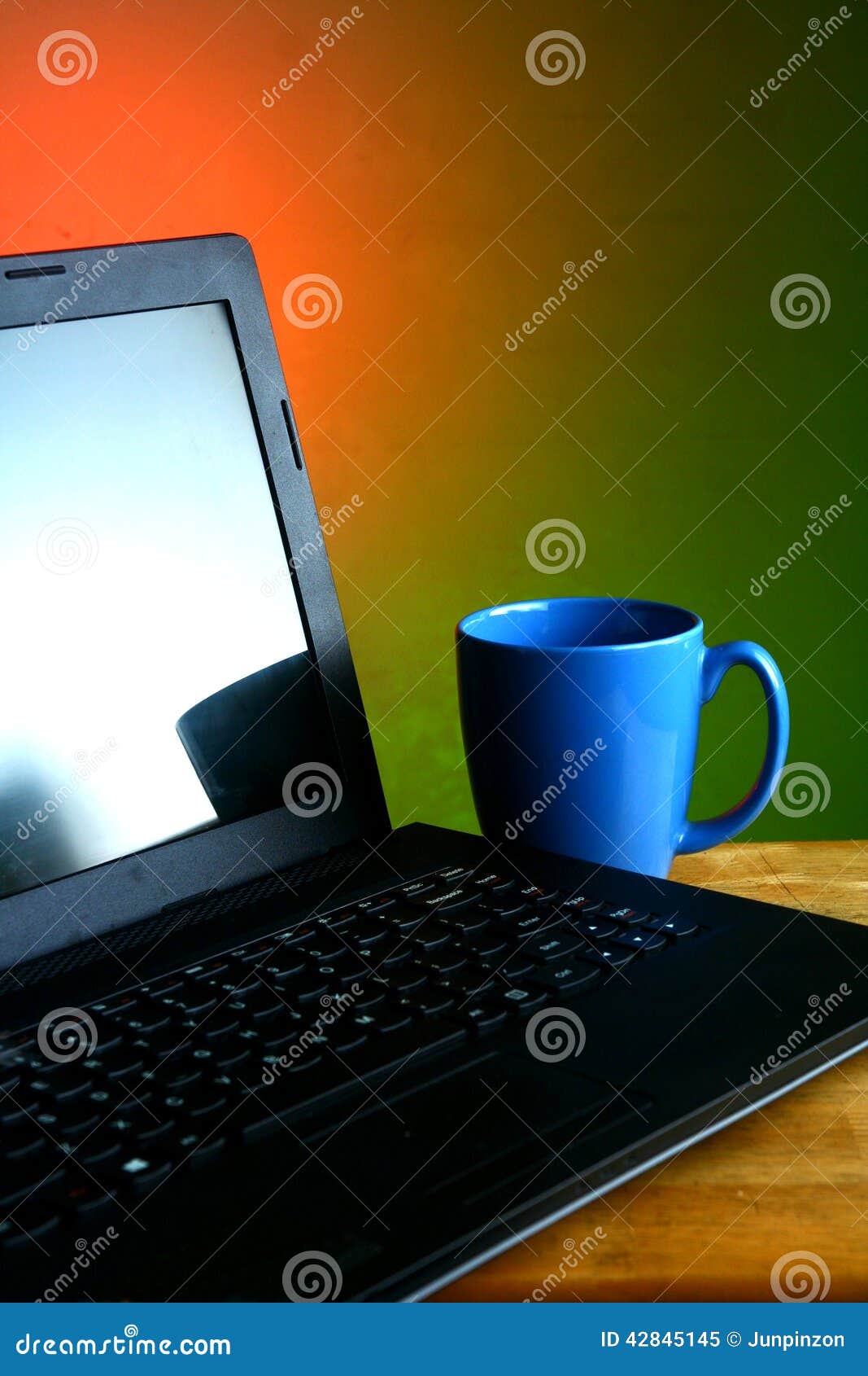 Laptop Computer and a Blue Coffee Mug Stock Image - Image of beverage ...