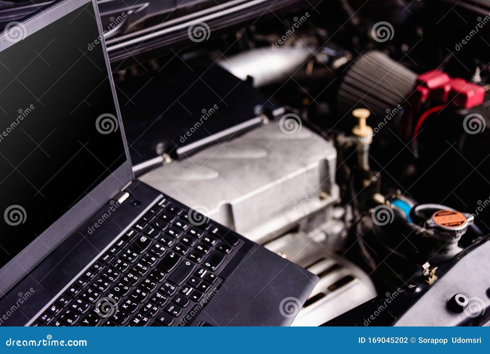 Laptop Computer on Car Mechanic Engine for Service Stock Photo - Image ...