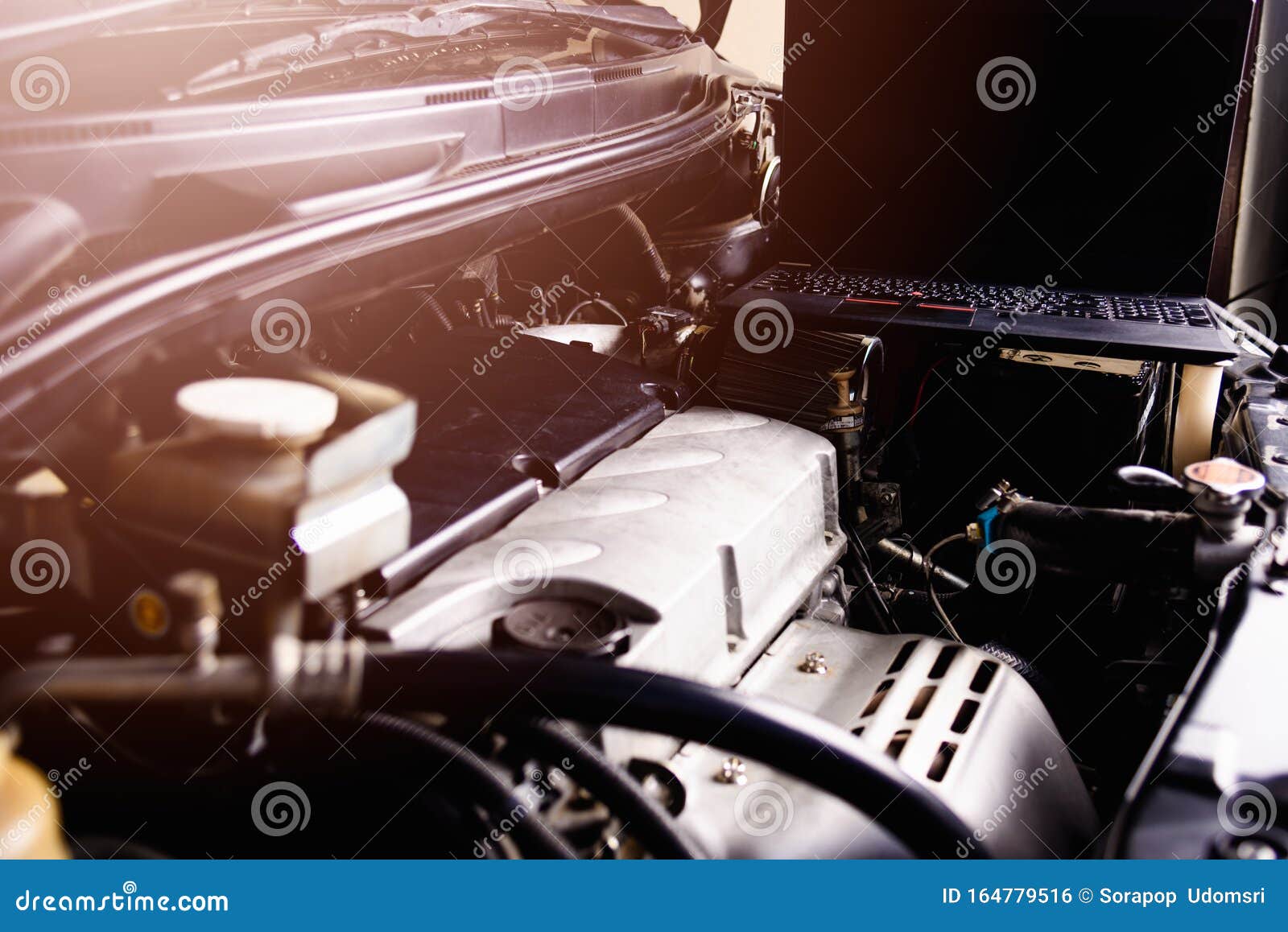 Laptop Computer on Car Mechanic Engine for Service Stock Photo - Image ...