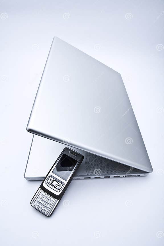 Laptop Computer with Cell Phone Stock Image - Image of open, technology ...