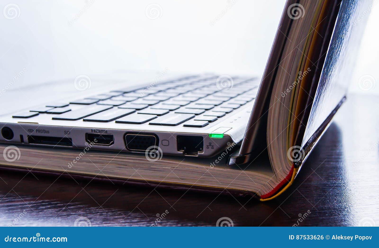 Laptop Computer with Colored Books Study, Library, Technology, Online ...