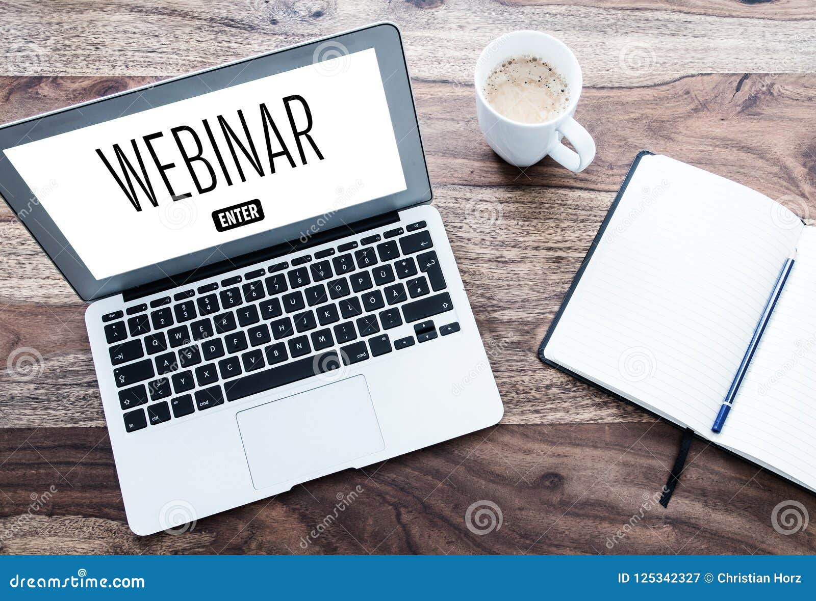 Laptop Computer on Desk with Word Webinar Displayed on Computer Screen ...
